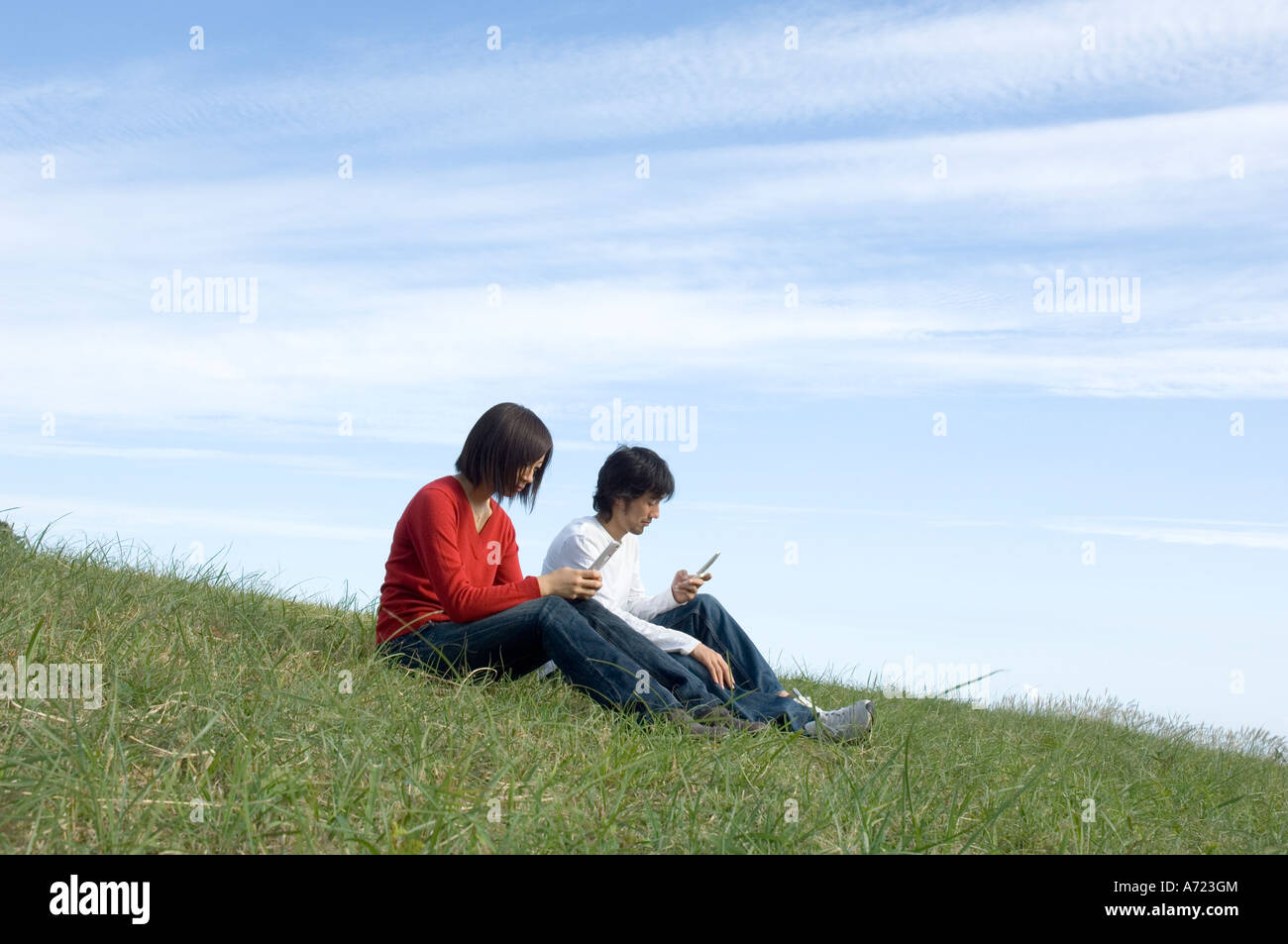 Using mobile phones japan hi-res stock photography and images - Alamy