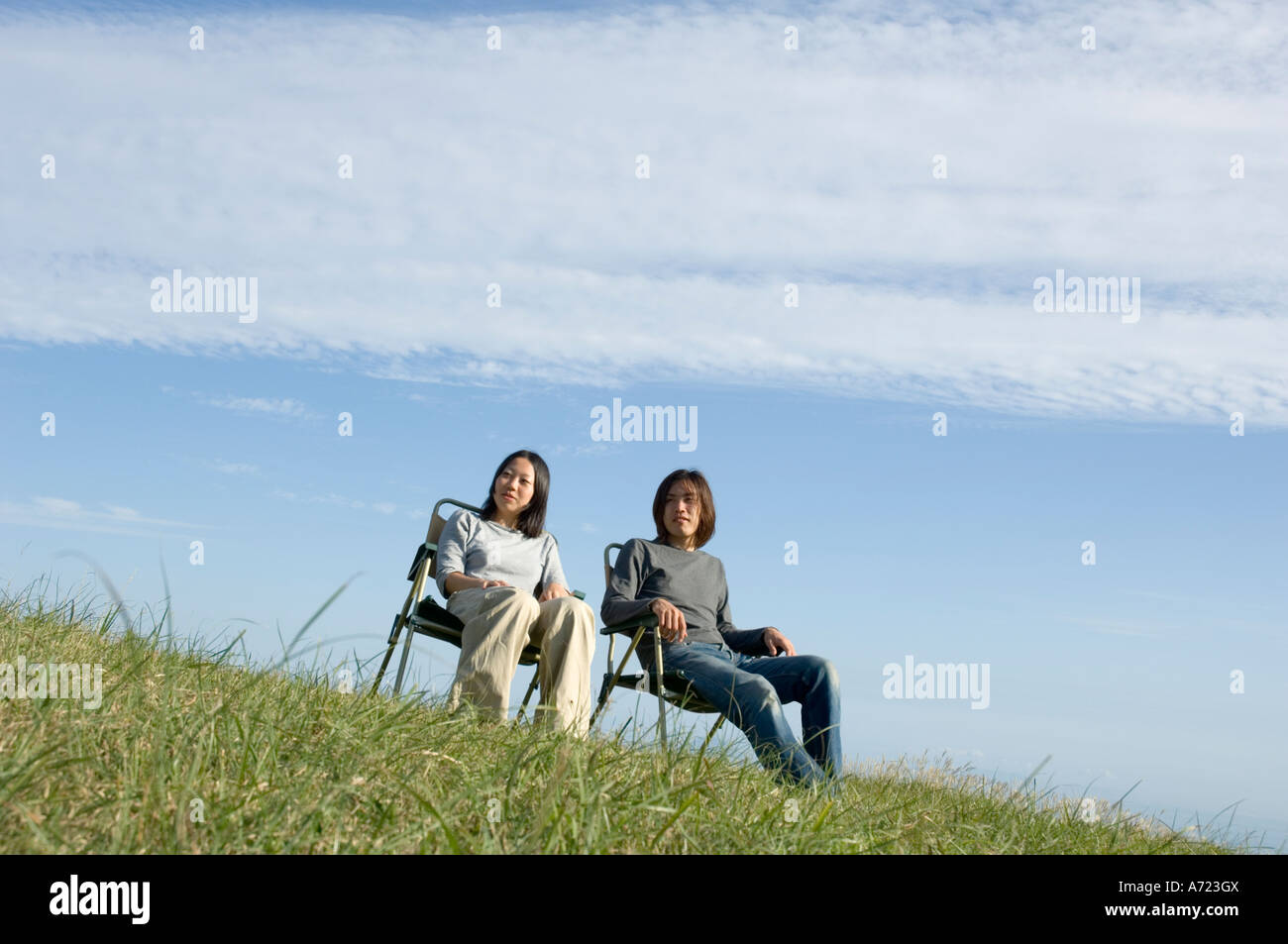 Chair sitting on grass hi-res stock photography and images - Alamy