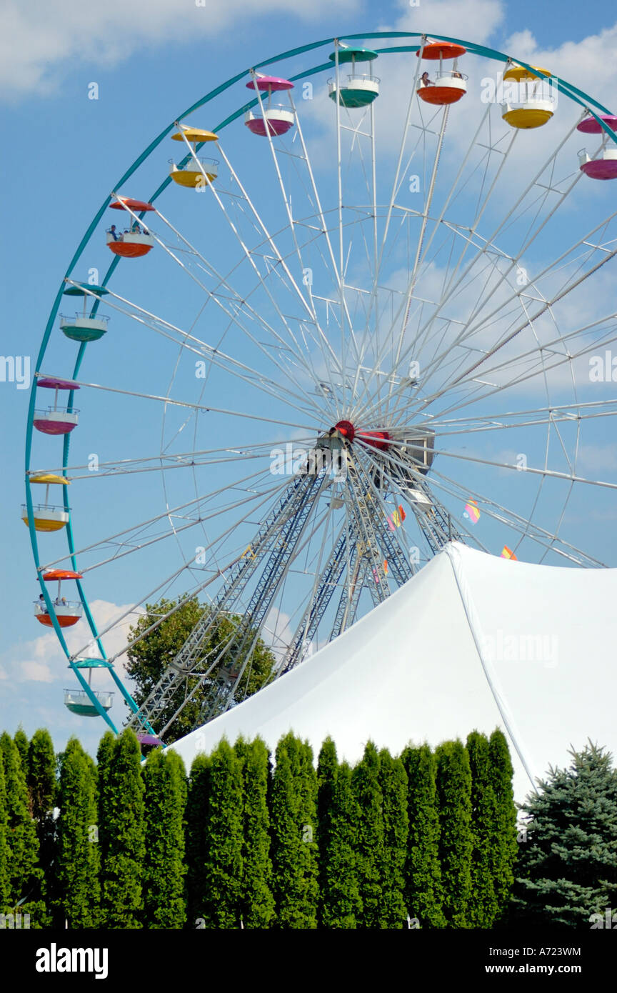 Colorful Ferris wheel at carnival Stock Photo - Alamy