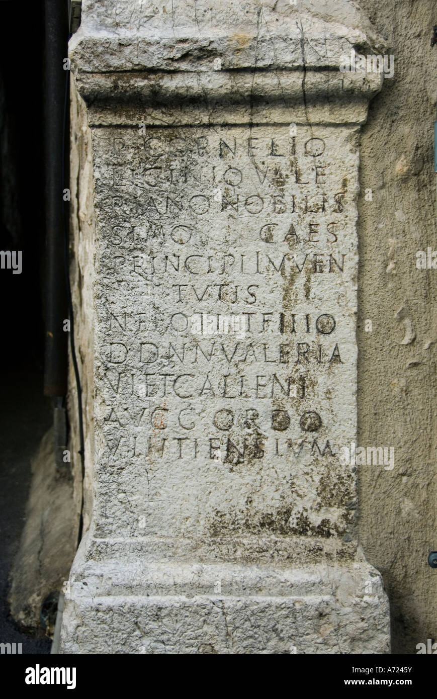 A Roman inscribed slab incorporated into a mediaeval building in the ...