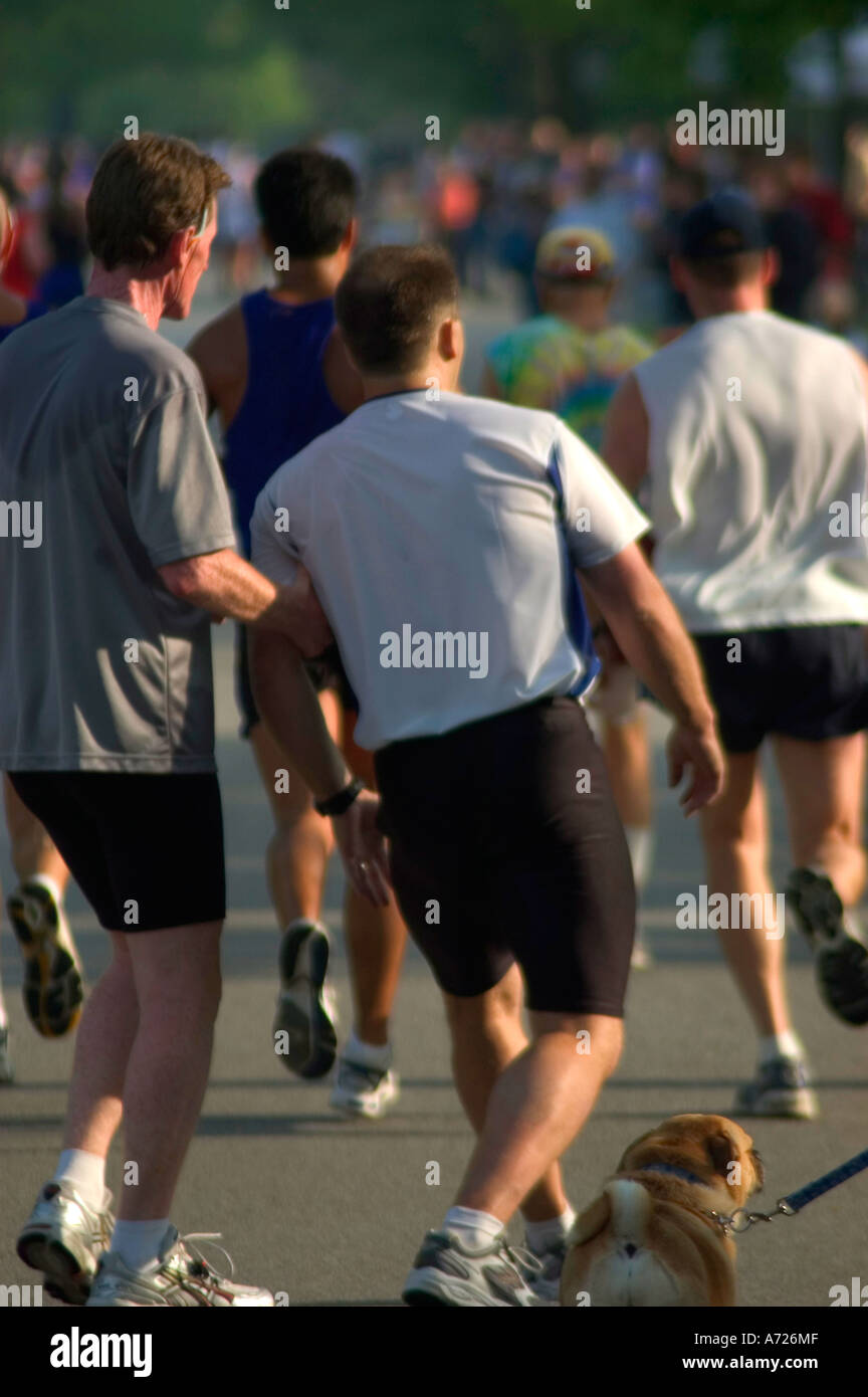 Helping runner marathon hi-res stock photography and images - Alamy