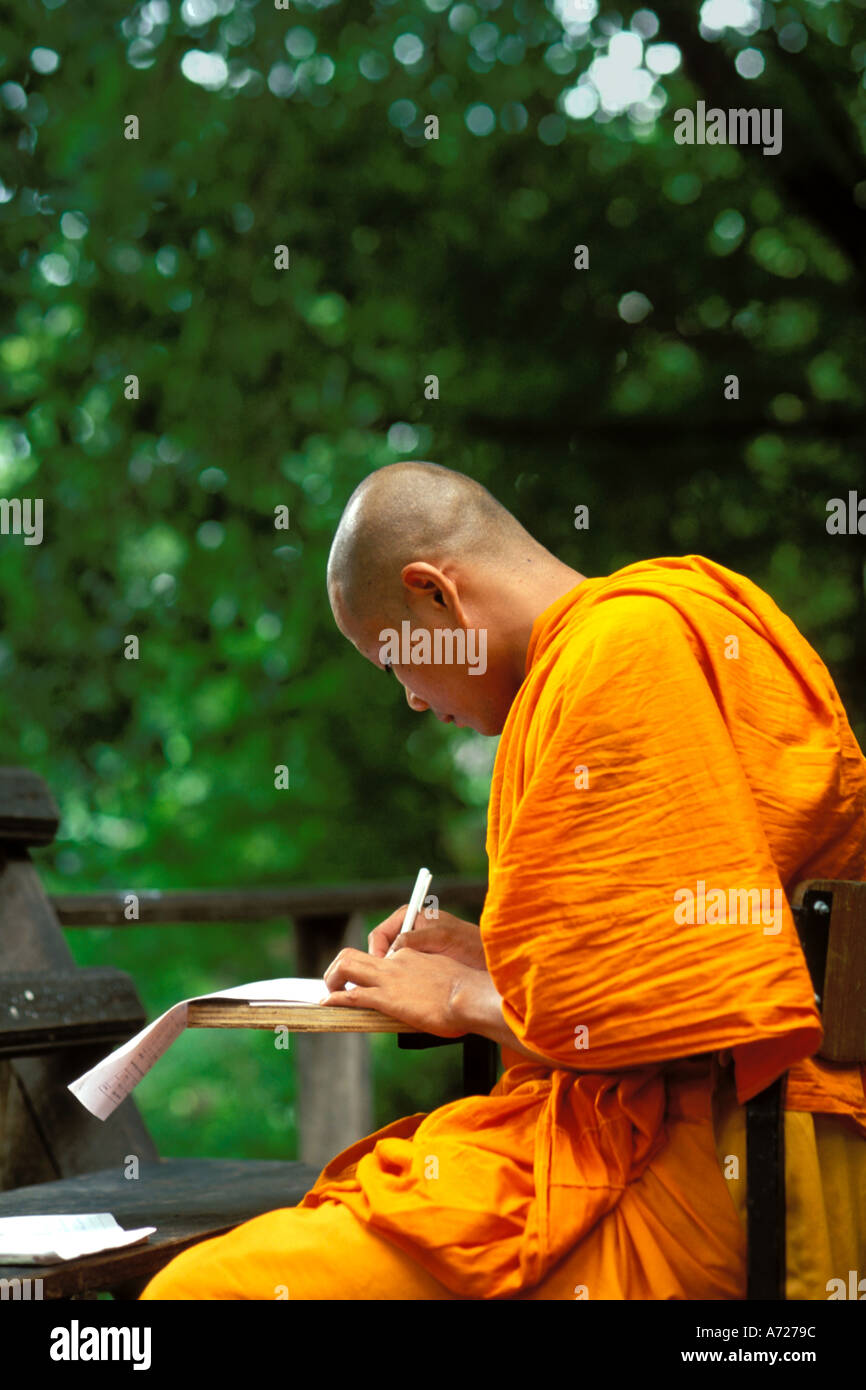 Buddhist monk writing hi-res stock photography and images - Alamy
