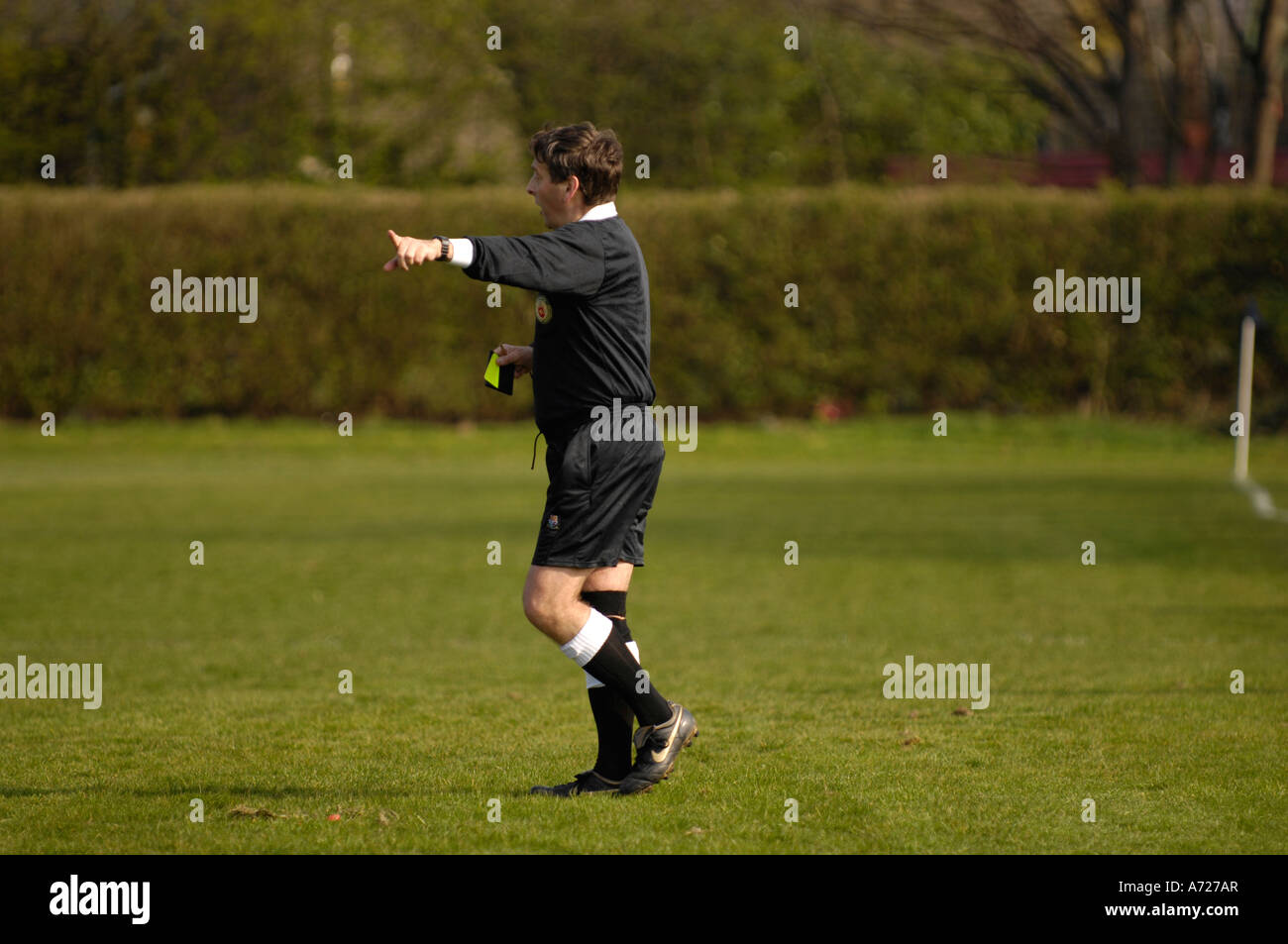 Football Referee Instructing Players Stock Photo - Alamy
