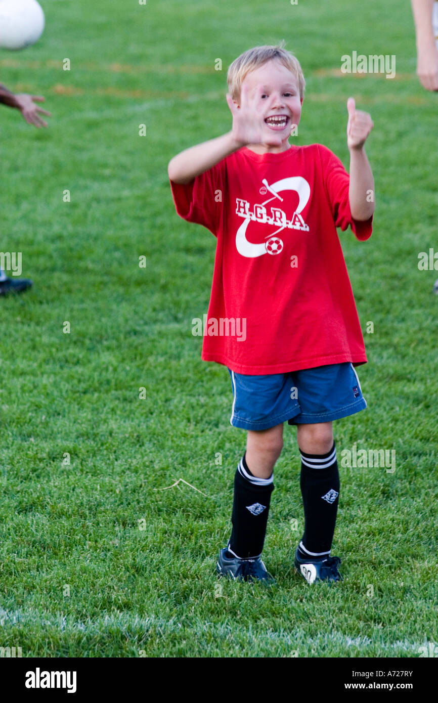 Happy boys enjoying soccer hi-res stock photography and images - Alamy
