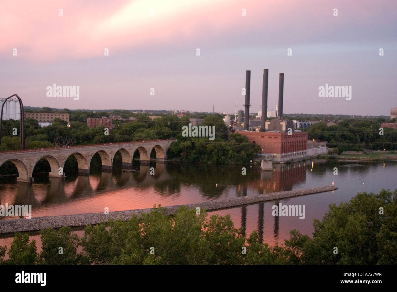 Evening reflections of Stone Arch Bridge over the Mississippi River at ...