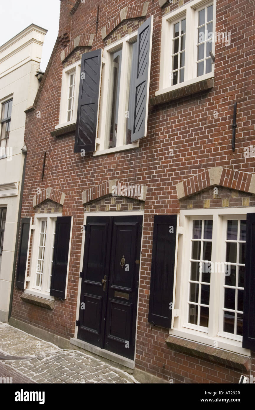 Traditional brick house witj black shutter window in Edam North Holland ...