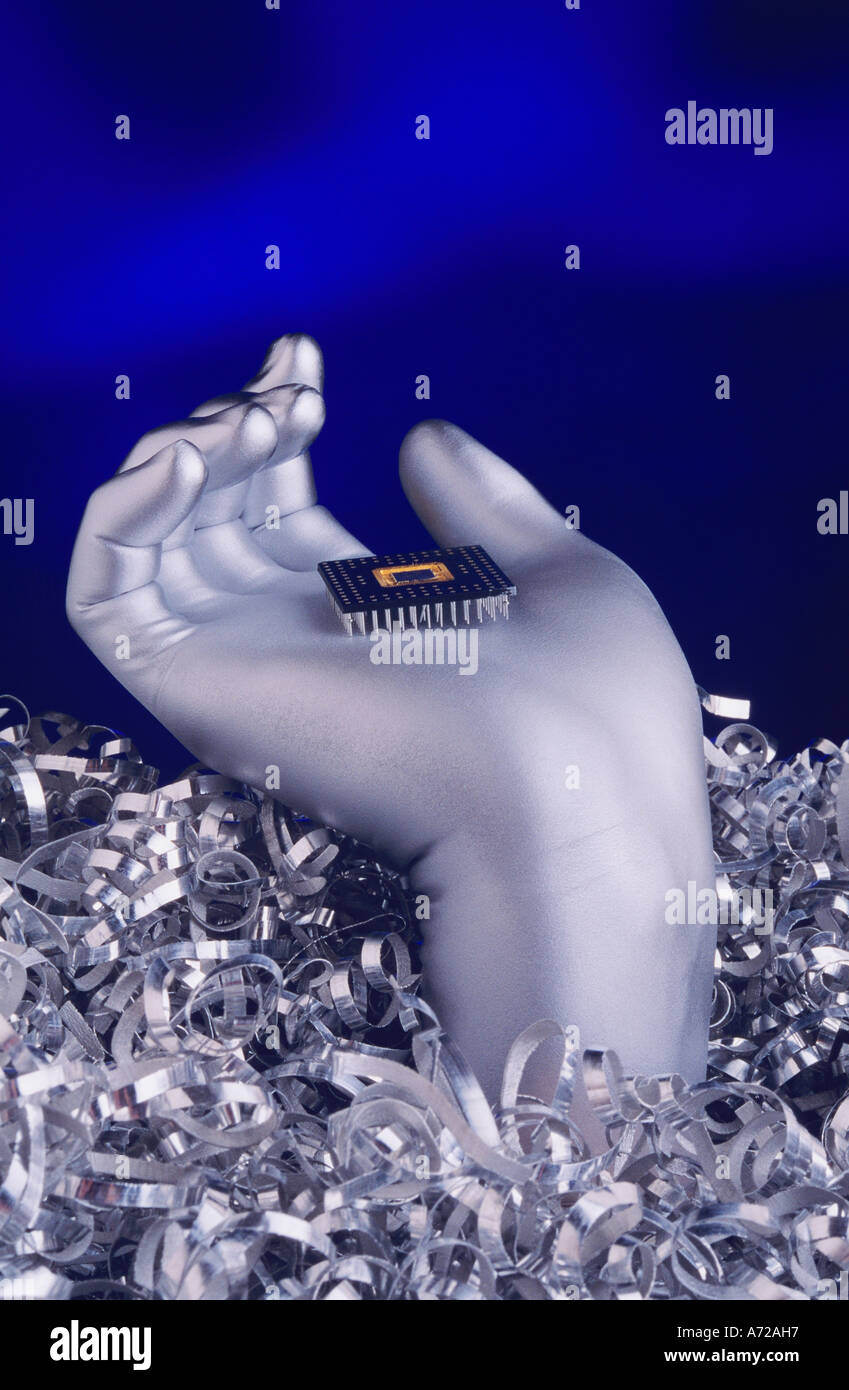 Silver Hand holding Computer Chip Stock Photo - Alamy