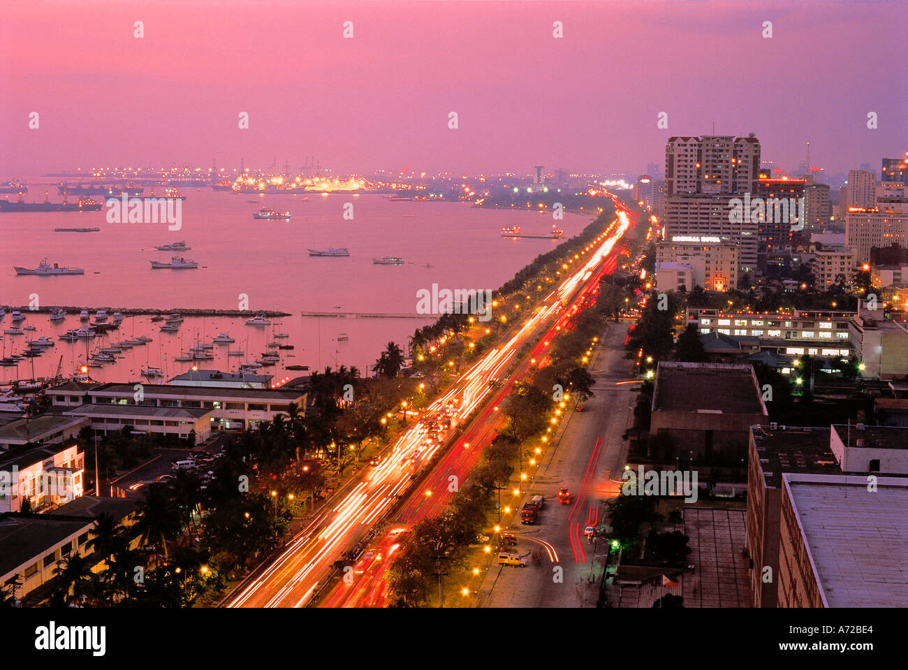 Manila Bay and Roxas Boulevard at Sunset with night lights Manila Stock ...