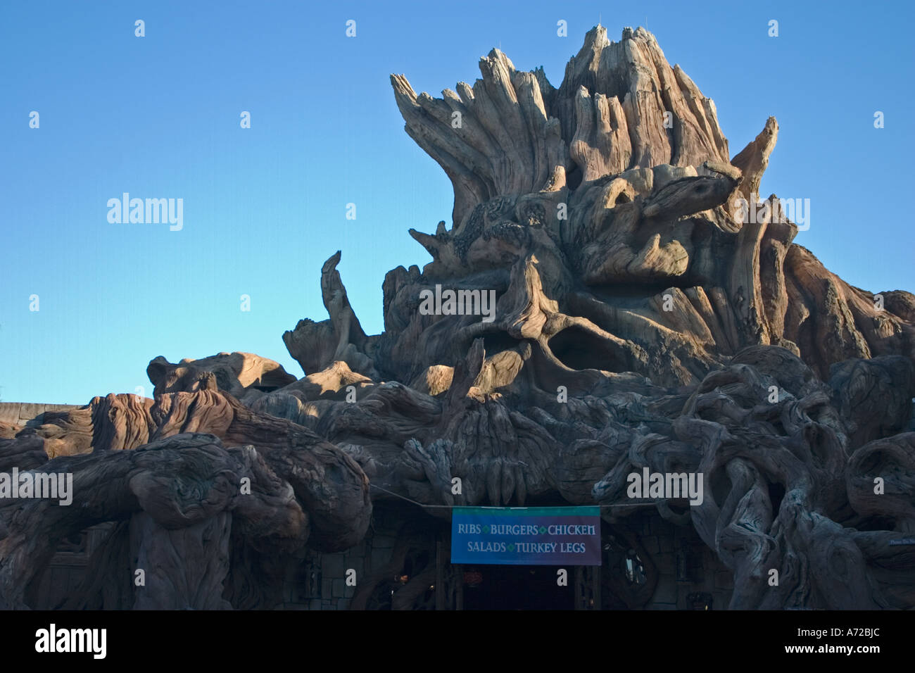 Fake rocks above Enchanted Oak Restaurant at dusk Islands of Adventure ...