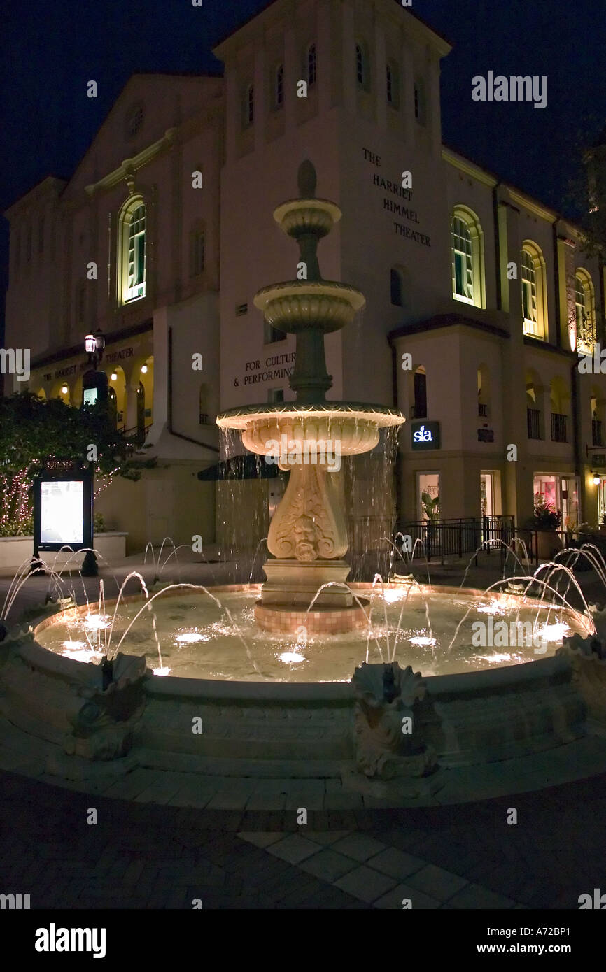 Illuminated fountain at night with Harriet Himmel Gilman Theater in ... Illuminated fountain at night with Harriet Himmel Gilman Theater in ...