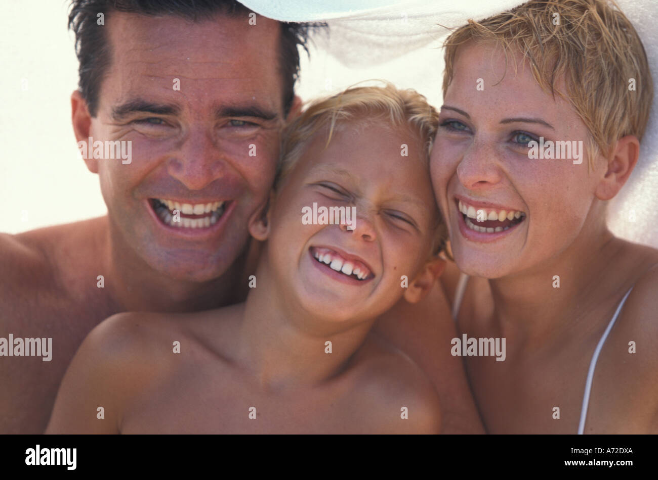 portrait of young family Stock Photo - Alamy