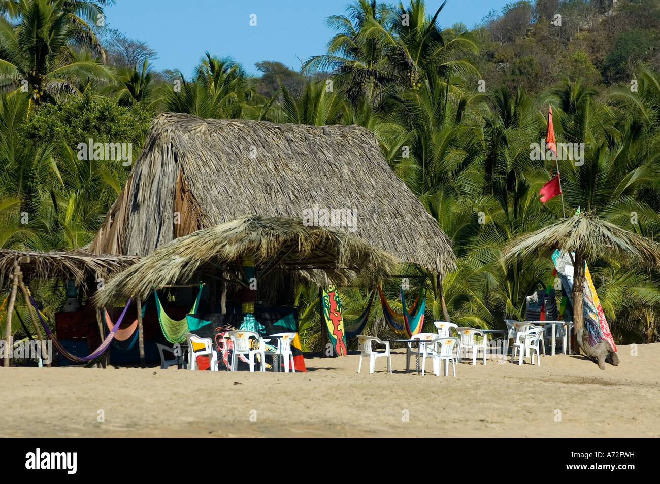 Zipolite - bar on the beach with white chair and hammocks - Oaxaca ...