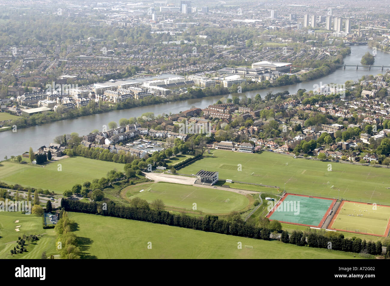 Aerial high level oblique view west of Grove Park Chiswick Quay ...