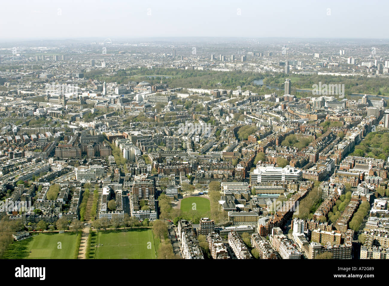 Aerial high level oblique view north of Chelsea Kensington ...