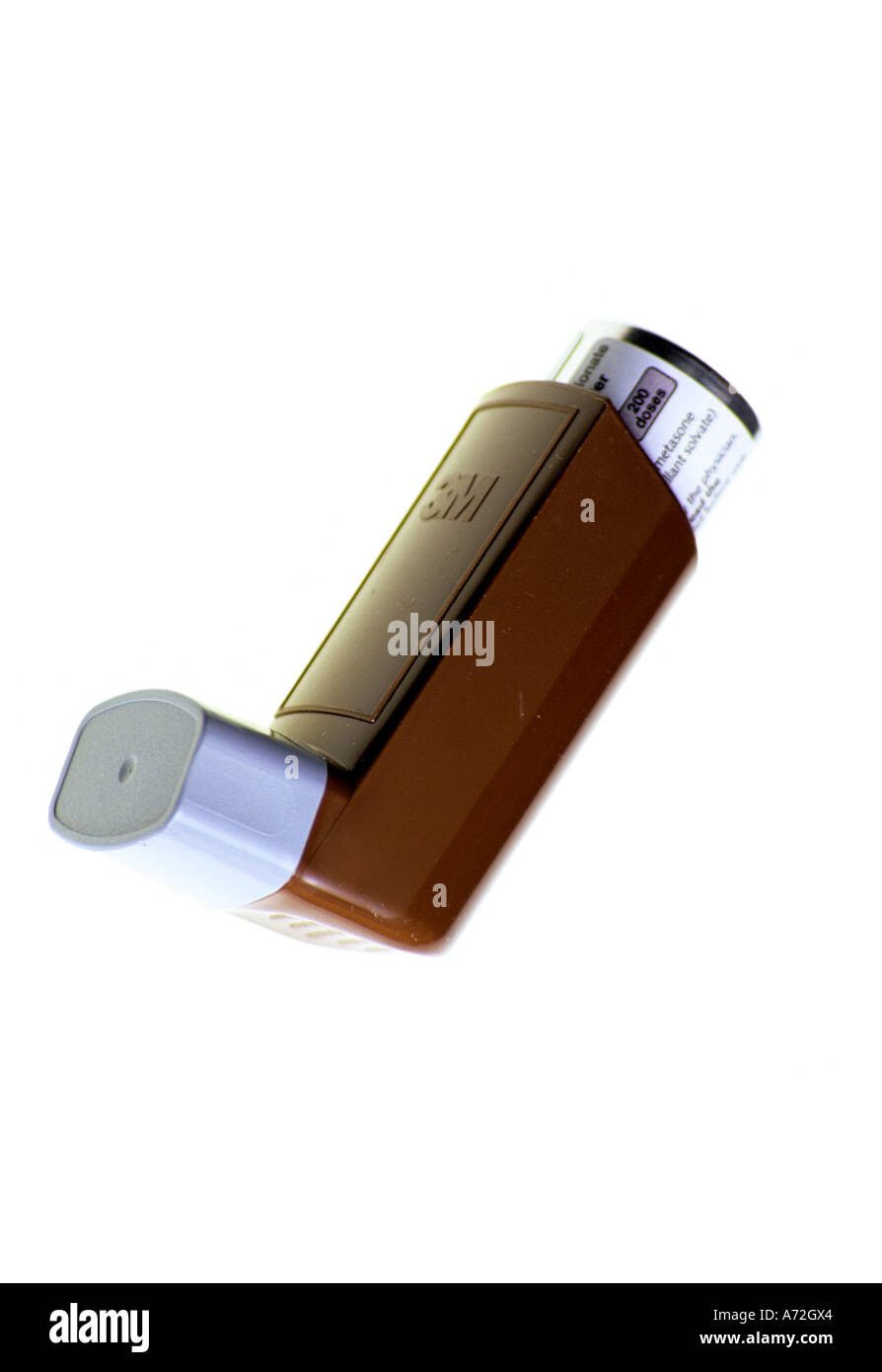 Asthma Inhaler on a white background Stock Photo - Alamy