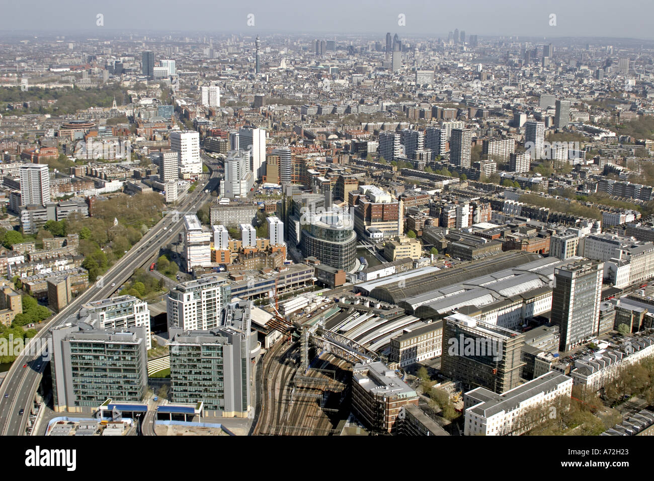 Aerial high level oblique view east across Paddington Basin to Mayfair ...