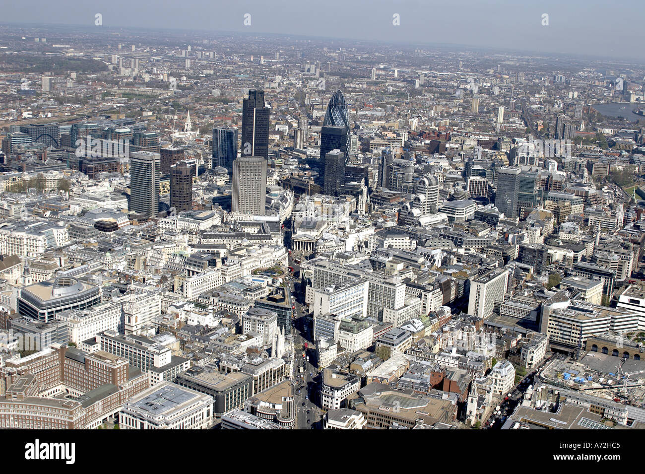 Aerial high level oblique view east of main buildings in City of London ...