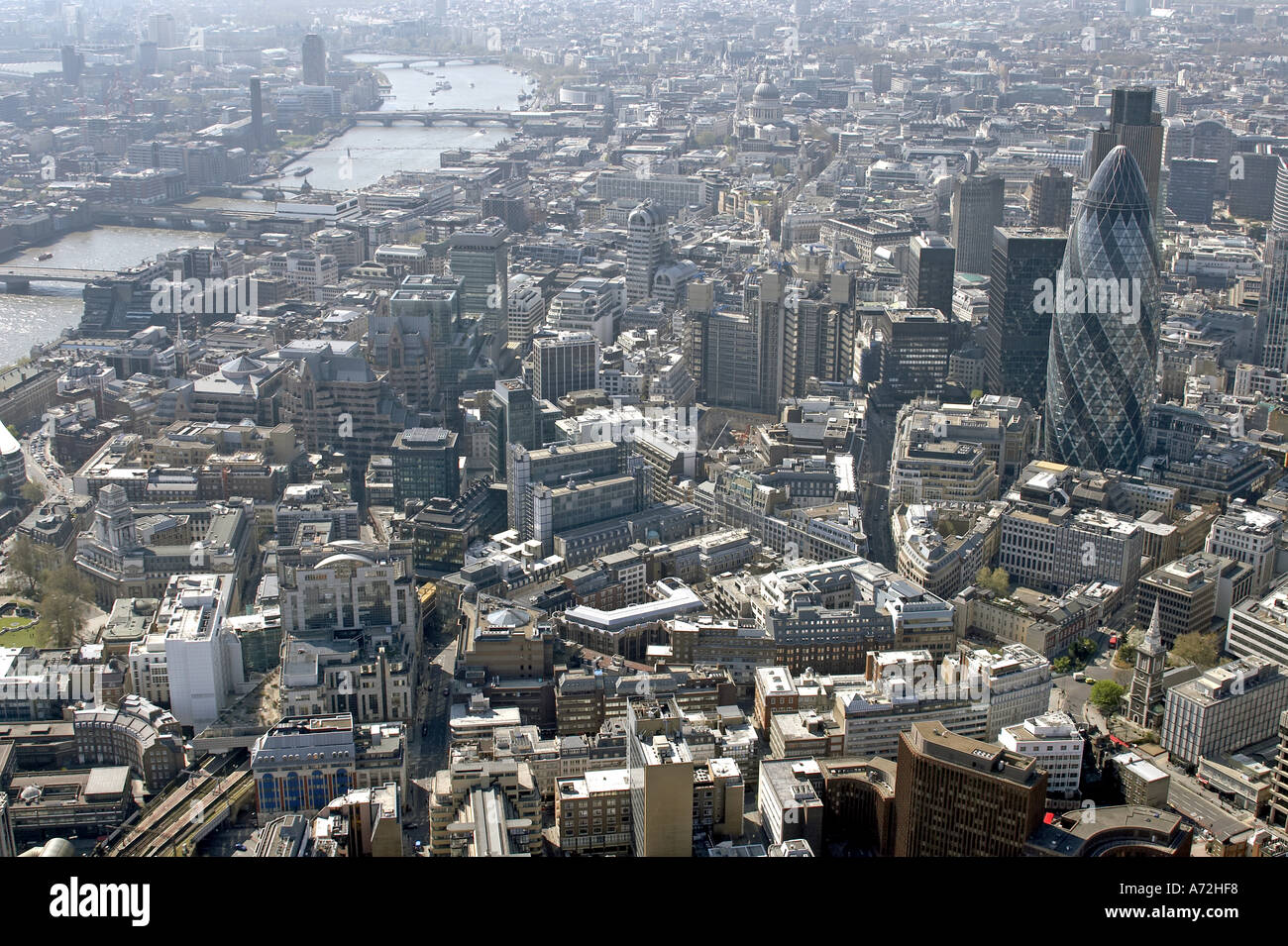 Aerial high level oblique view west of main buildings in City of London ...