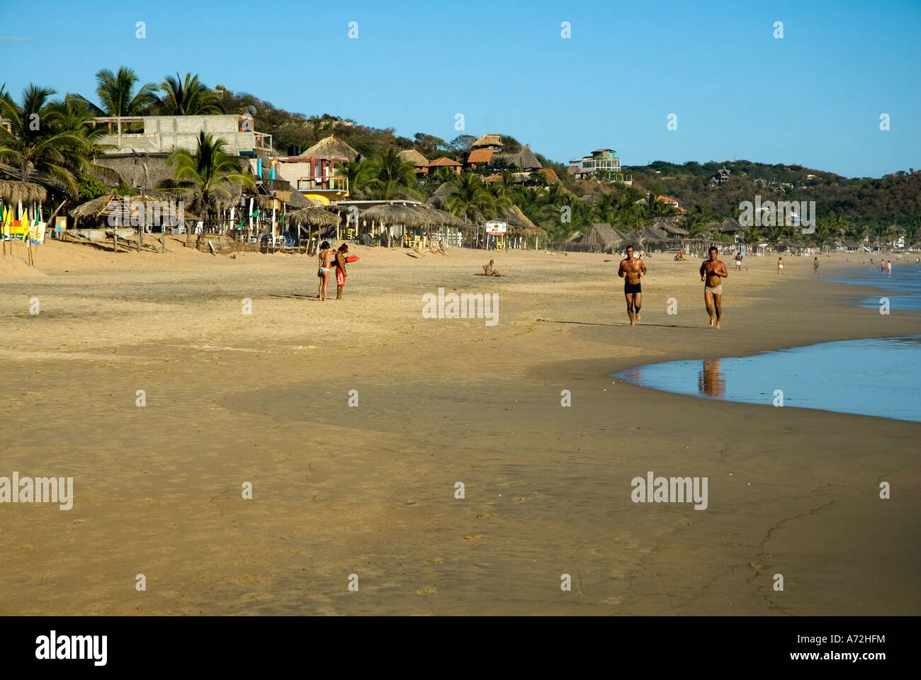 Zipolite beach oaxaca palm hi-res stock photography and images - Alamy