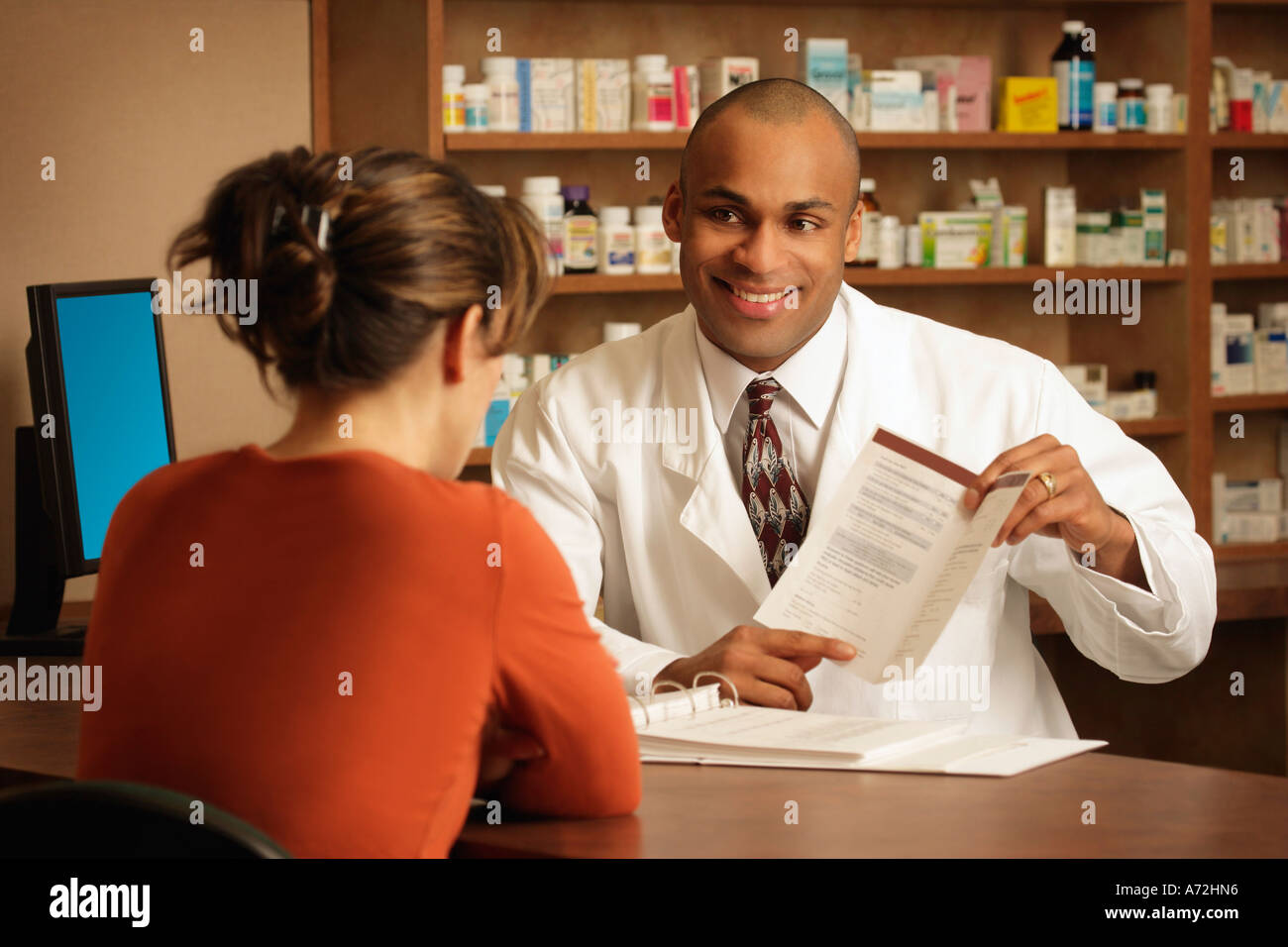 Pharmacist explains medical information Stock Photo - Alamy