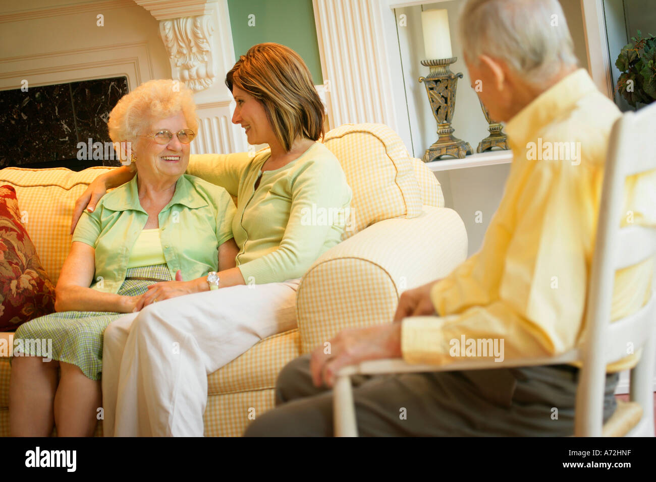 Woman visits her parents Stock Photo - Alamy