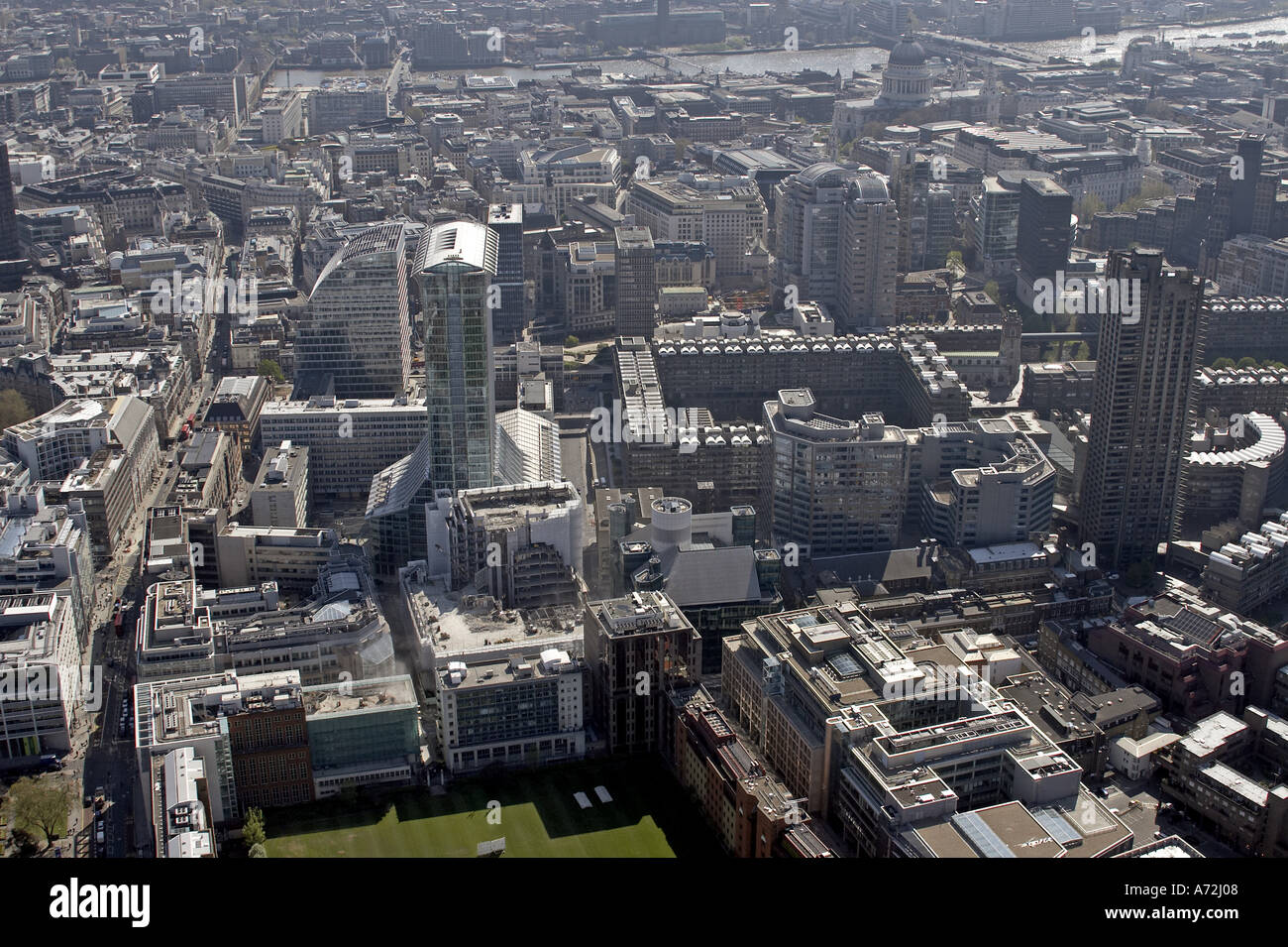 Aerial high level oblique view south of City of London buildings Moor ...