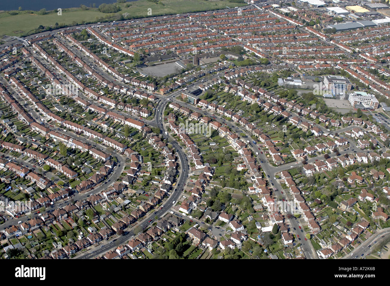 Aerial high level oblique view north east of suburban streets and ...