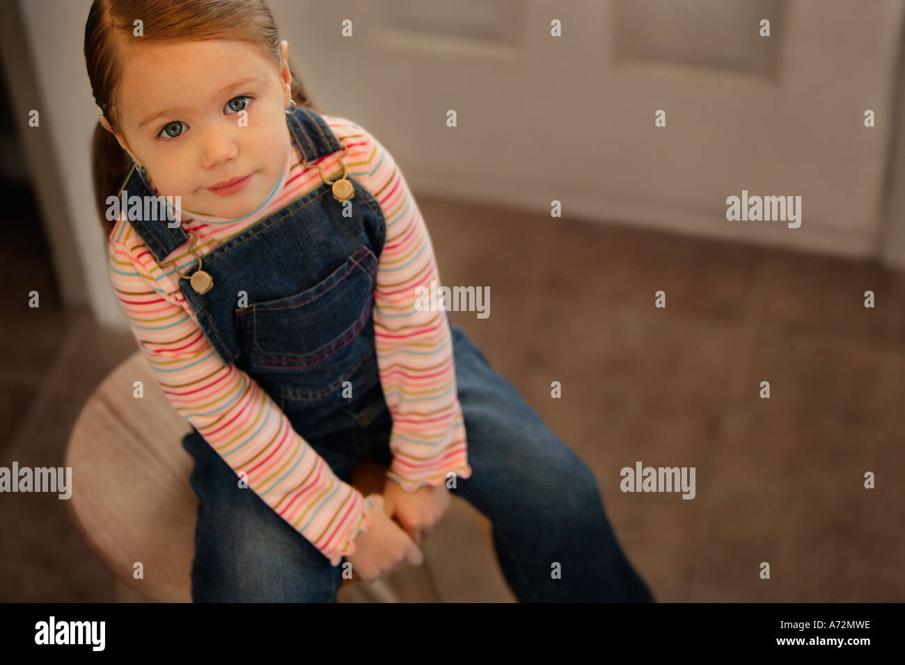 Child with a smirk Stock Photo - Alamy