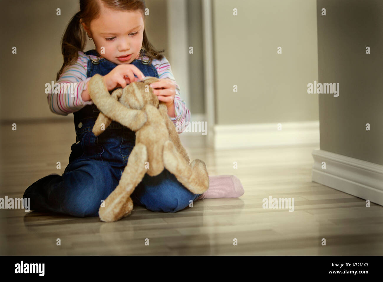 Child playing with toy Stock Photo - Alamy