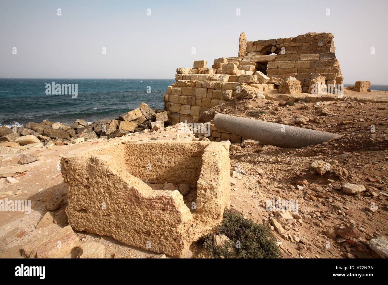 The remains of the Old Lighthouse at Leptis Magna Harbour in Libya ...