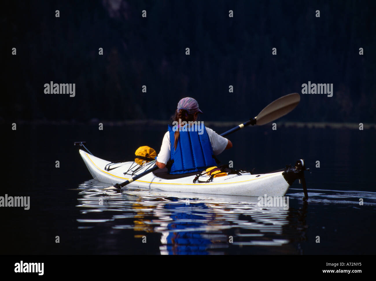 Kayaker and reflection Stock Photo - Alamy