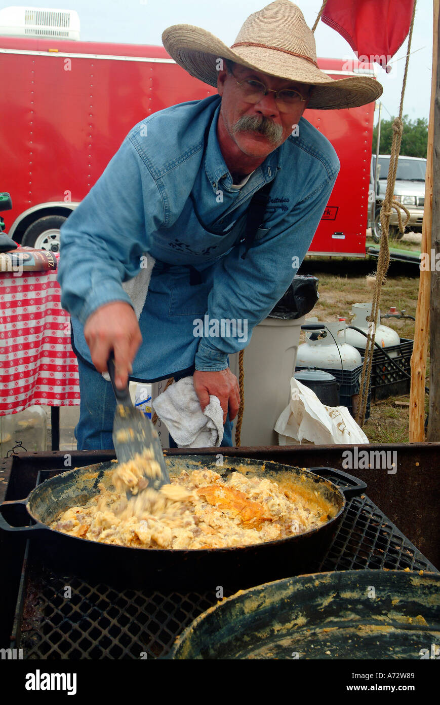 Cowboy cooker during a trailride in Bandera Stock Photo - Alamy