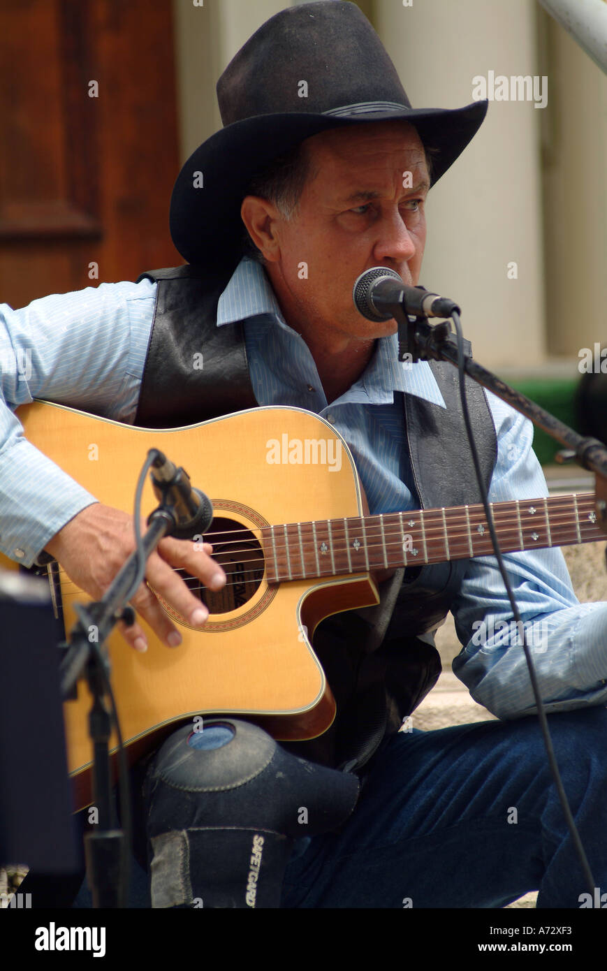 Cow boy singer during a show in Bandera Texas Stock Photo - Alamy