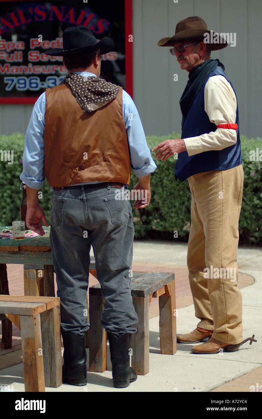 Two cowboys actors standing and acting Stock Photo - Alamy