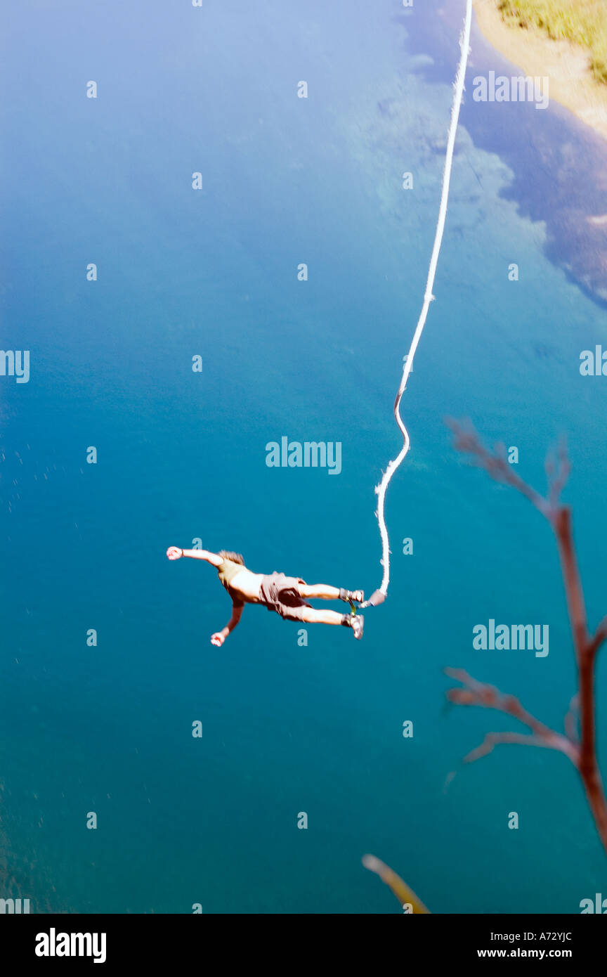 Man jumping over river hi-res stock photography and images - Alamy