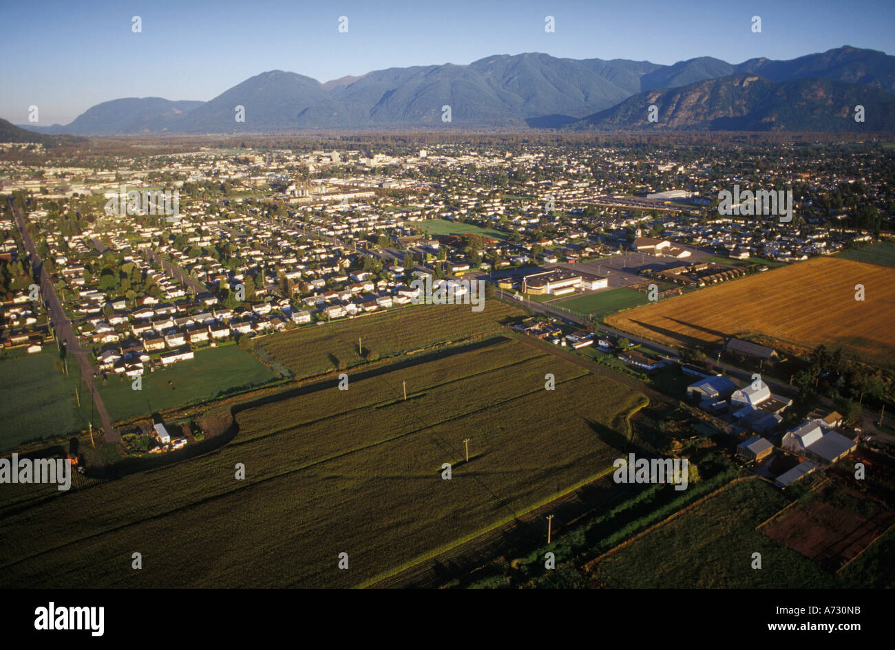 Overview of a town or agricultural community Stock Photo - Alamy