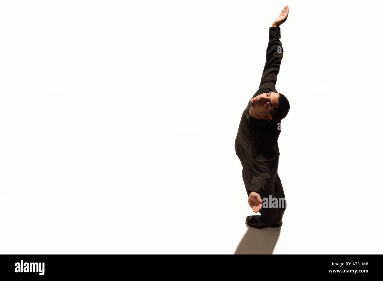 Man arms raised surrendering Stock Photo - Alamy