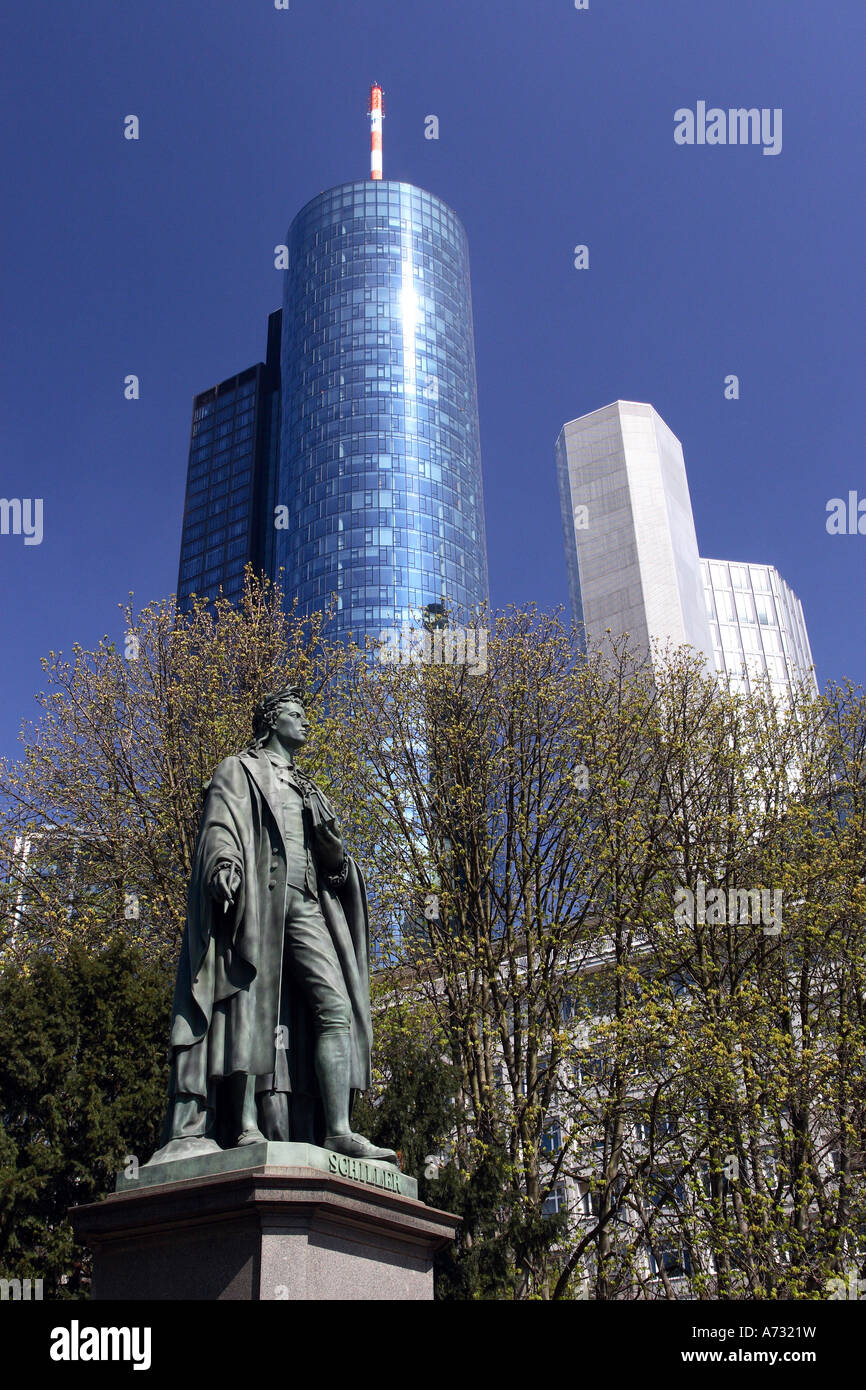 The statue of German author and poet Schiller amidst high rise ...