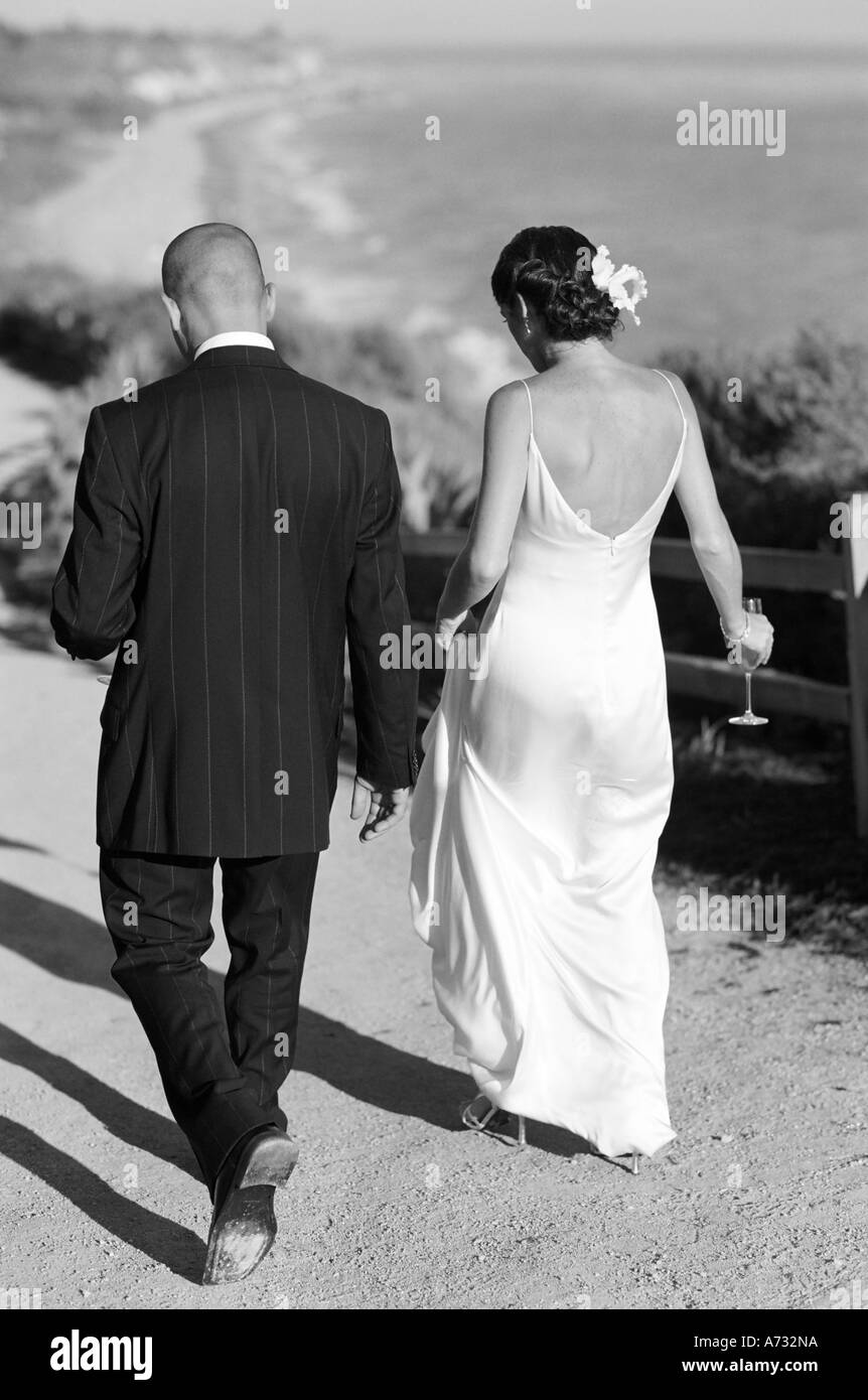 Classic Bride and Groom Walking Stock Photo - Alamy