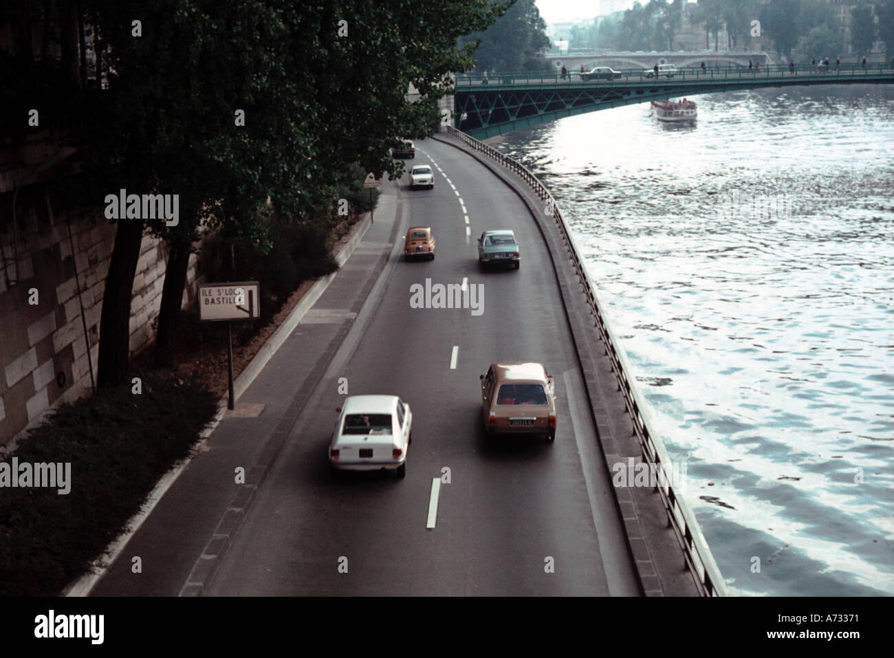 Sparse traffic on the road alongside the Seine river in Paris during ...