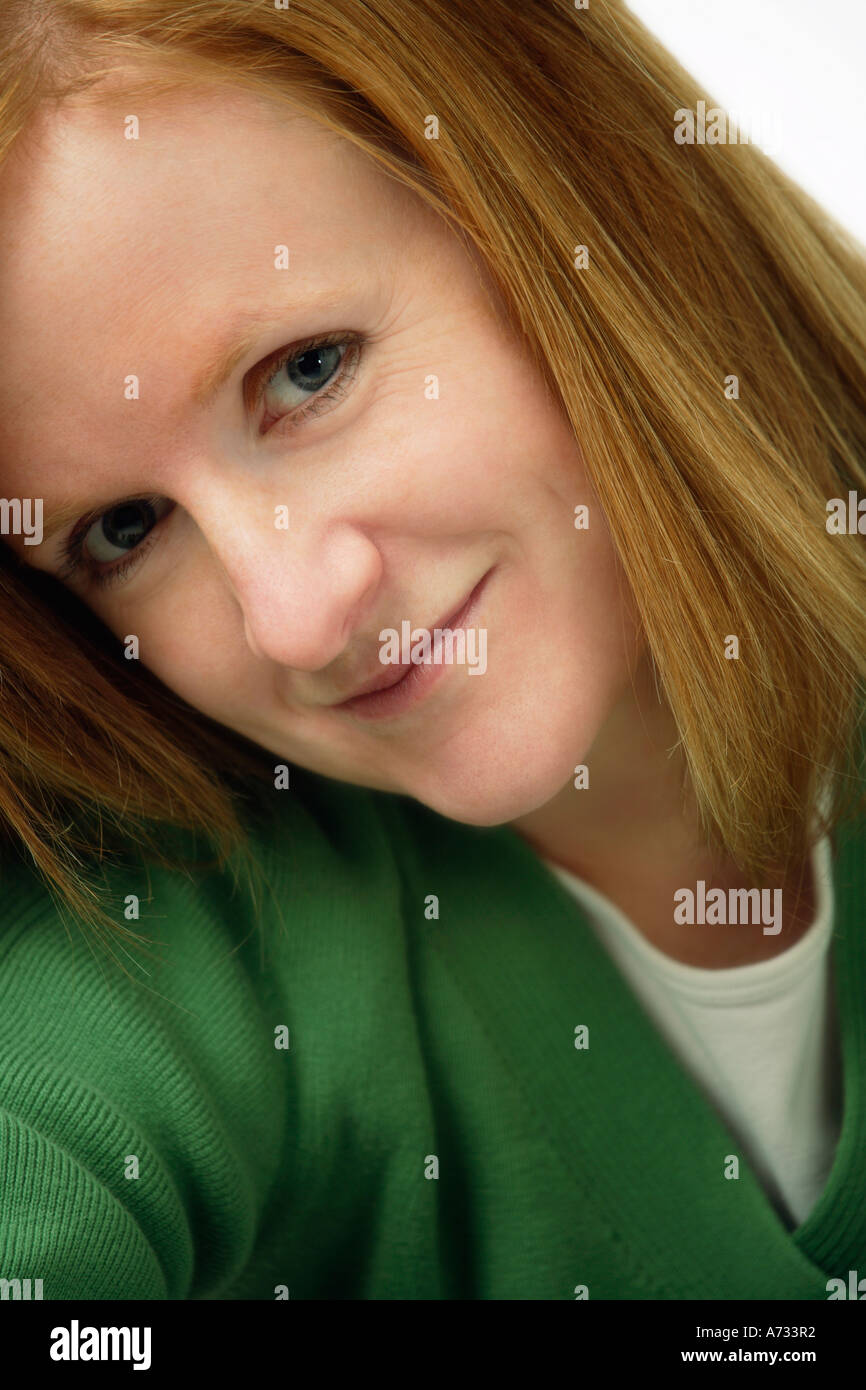 Women with head tilted Stock Photo - Alamy