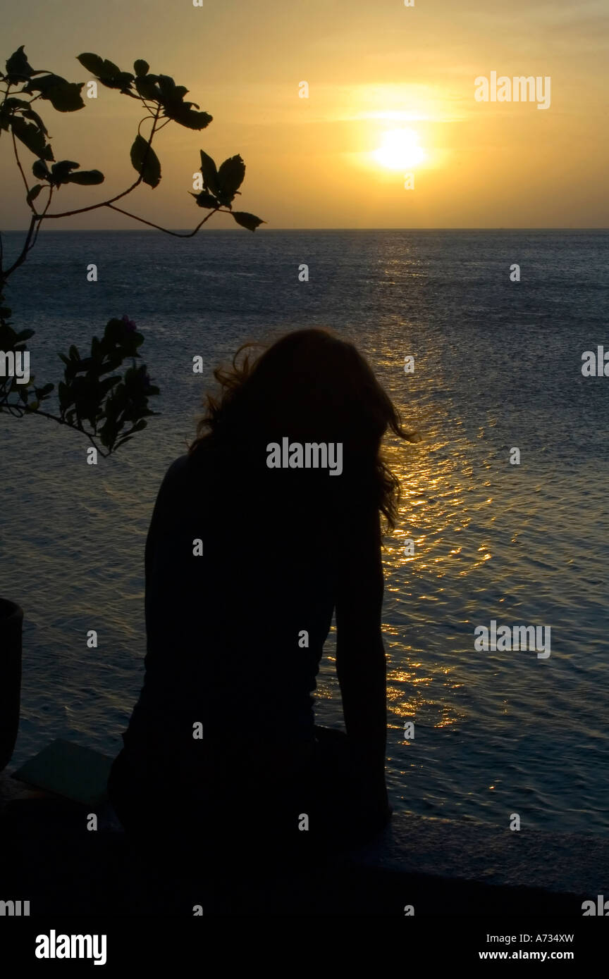 Woman enjoying the sunset. Colombia Stock Photo - Alamy