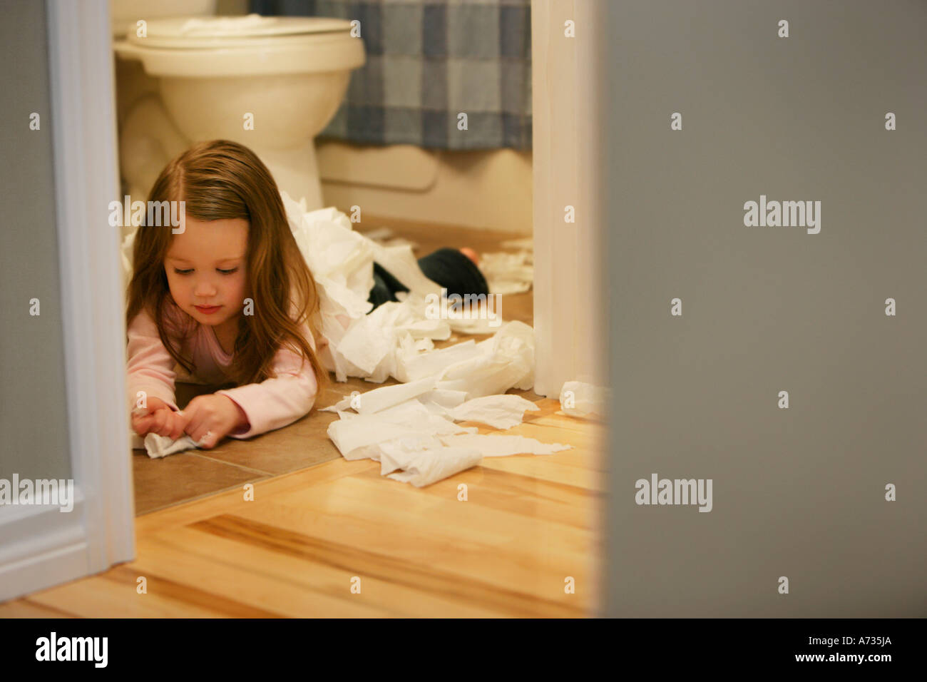 Child gets into mischief Stock Photo - Alamy