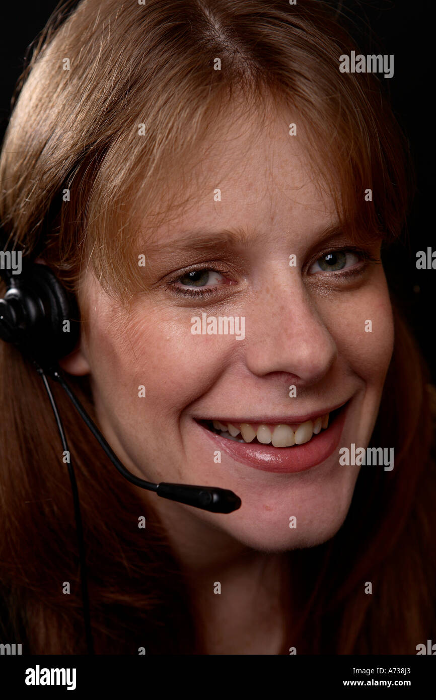 Woman wearing telephone headset Stock Photo - Alamy