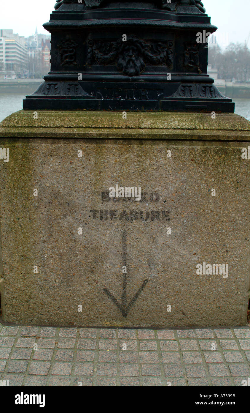 embankment london graffiti buried treasure Stock Photo - Alamy