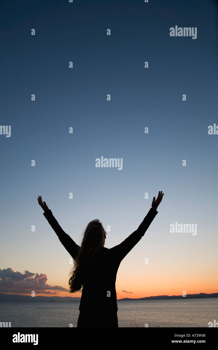 Silhouetted spiritual woman hi-res stock photography and images - Alamy