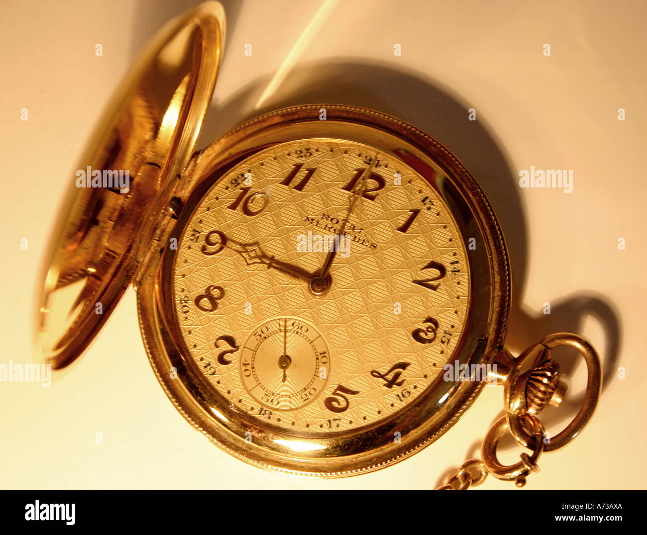 Gold pocket watch Stock Photo - Alamy