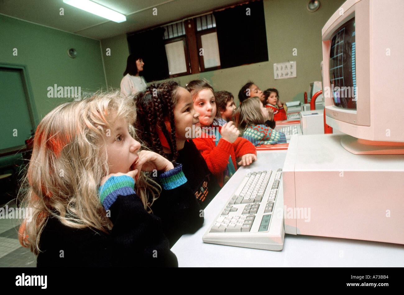 Group of children seated in classroom hi-res stock photography and ...