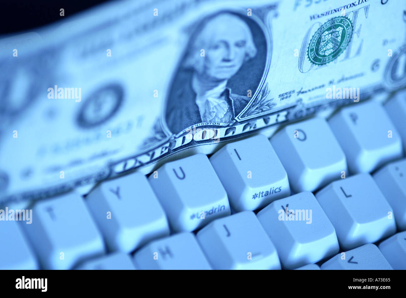 1 one dollar on keyboard Stock Photo - Alamy