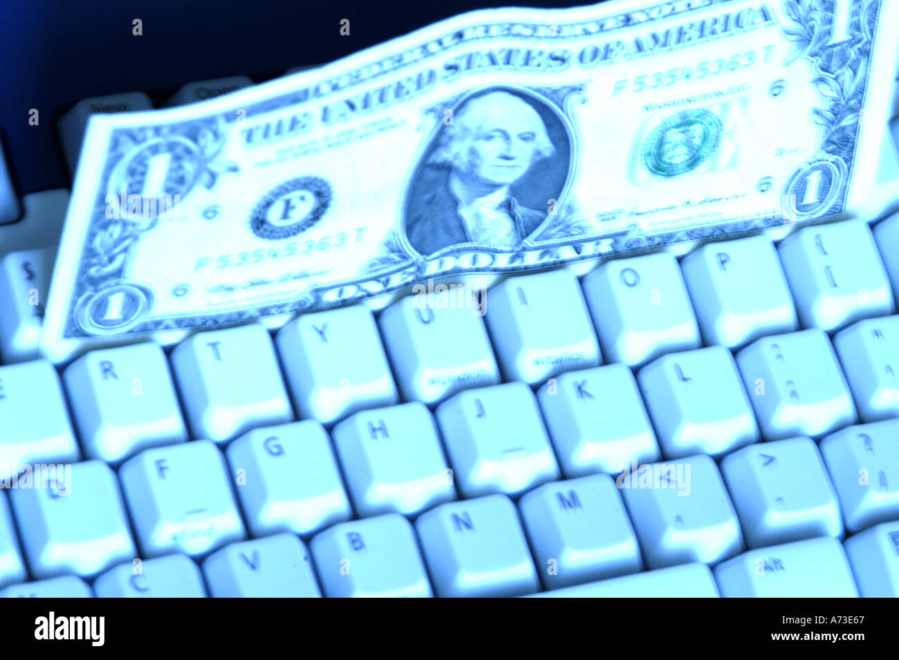 1 one dollar on keyboard Stock Photo - Alamy